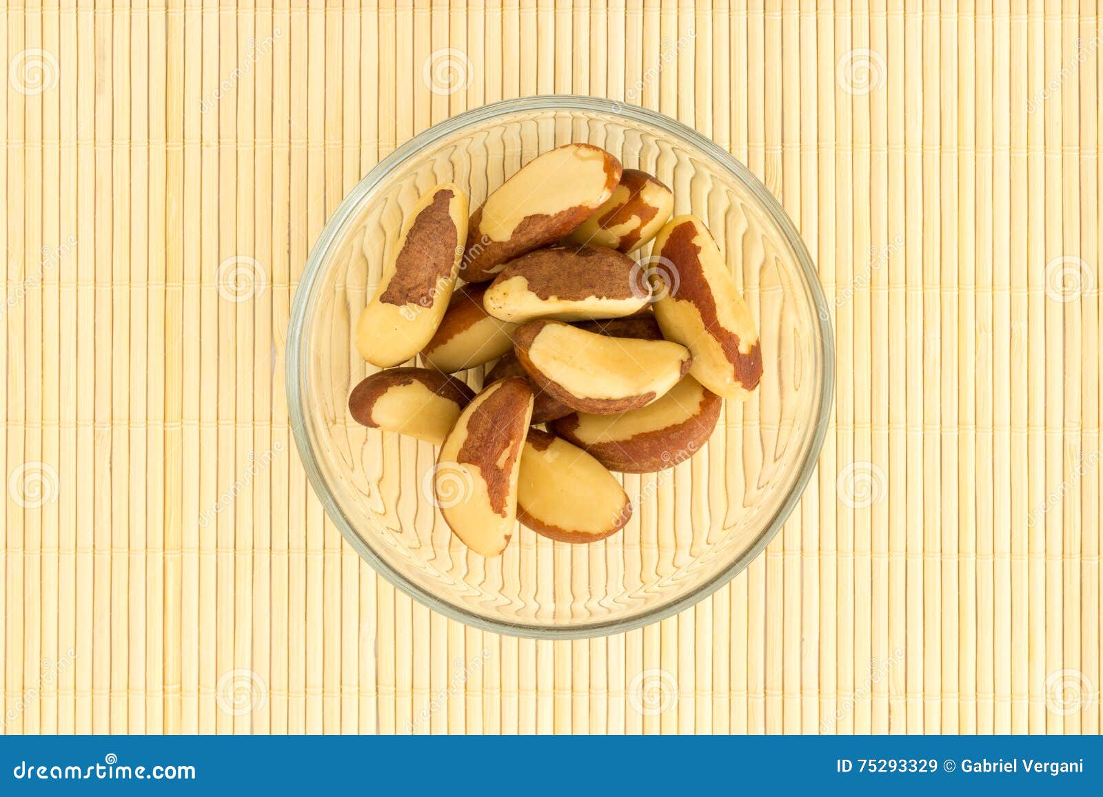 Brazil Nuts and bamboo mat stock image. Image of closeup - 75293329