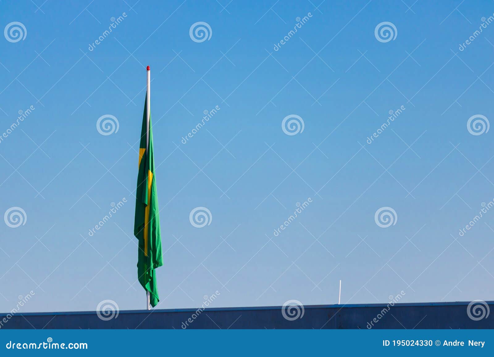 Brazilian Flag on Pole without Wind in Front of Blue Sky Stock Photo ...