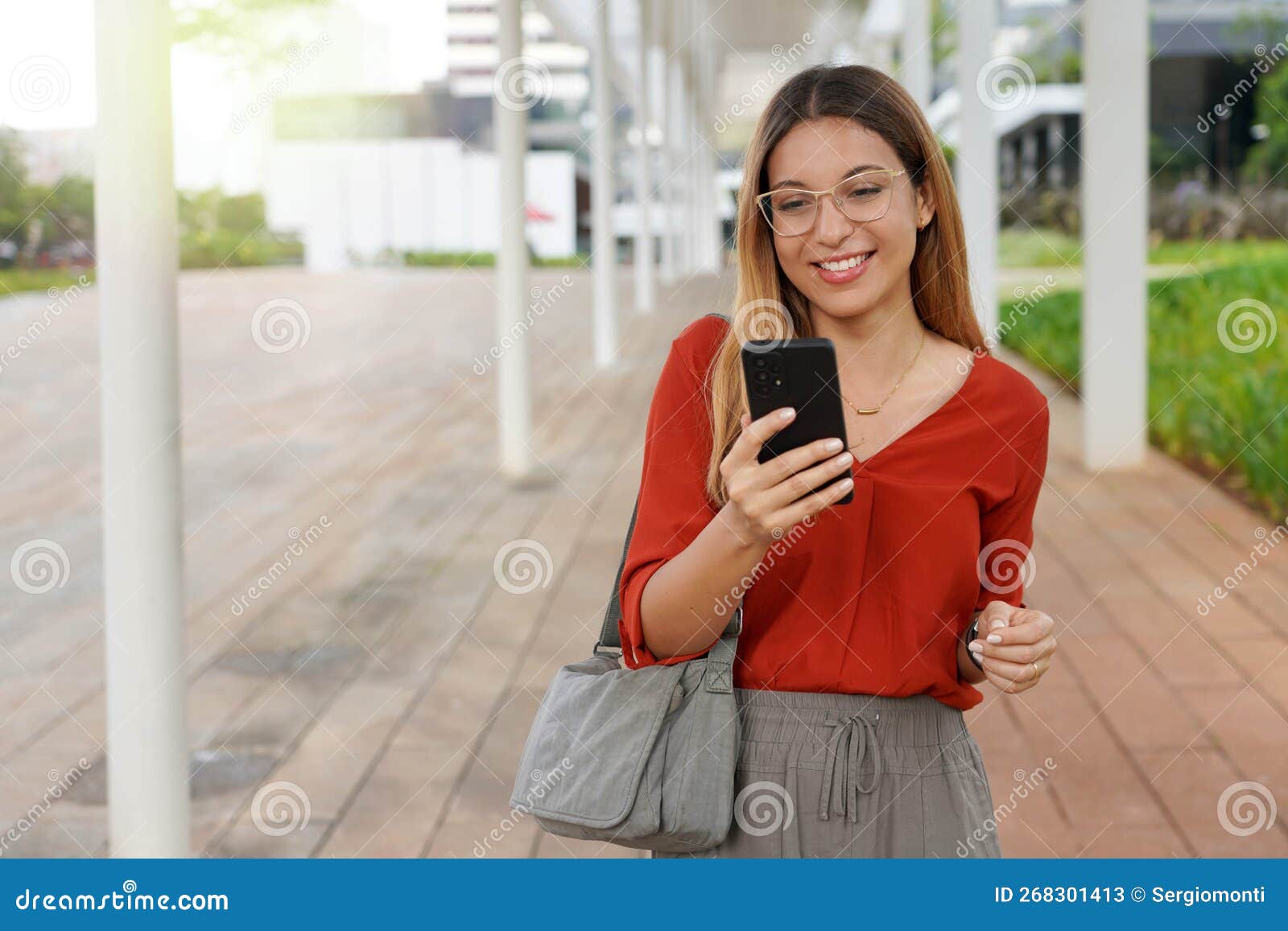 Brazilian University Student Watching Her Smartphone Outdoors Stock ...