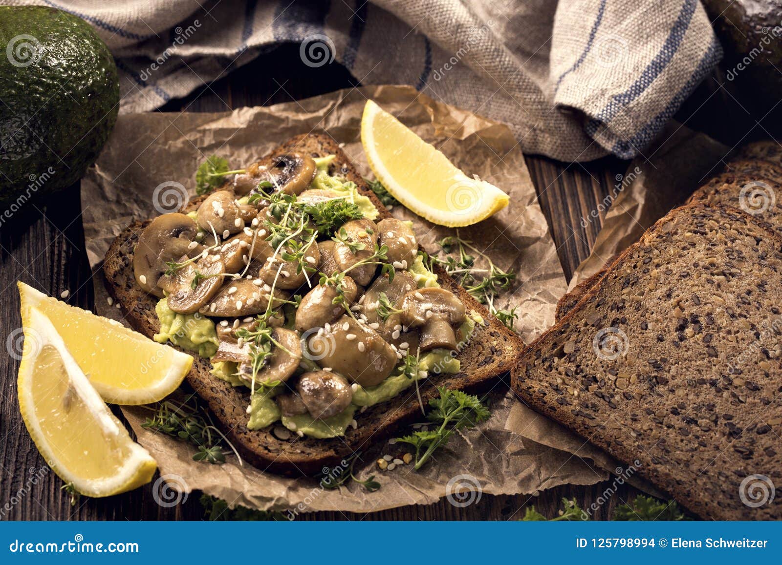 Bread with Avocado Spread and Champignons Stock Photo - Image of spread ...