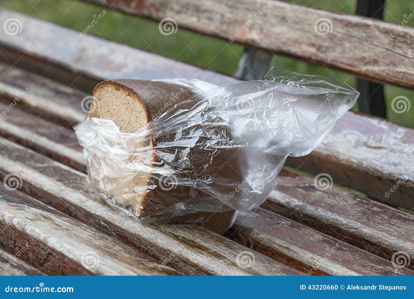 Bread on a Bench in a Transparent Plastic Bag Stock Photo - Image of ...