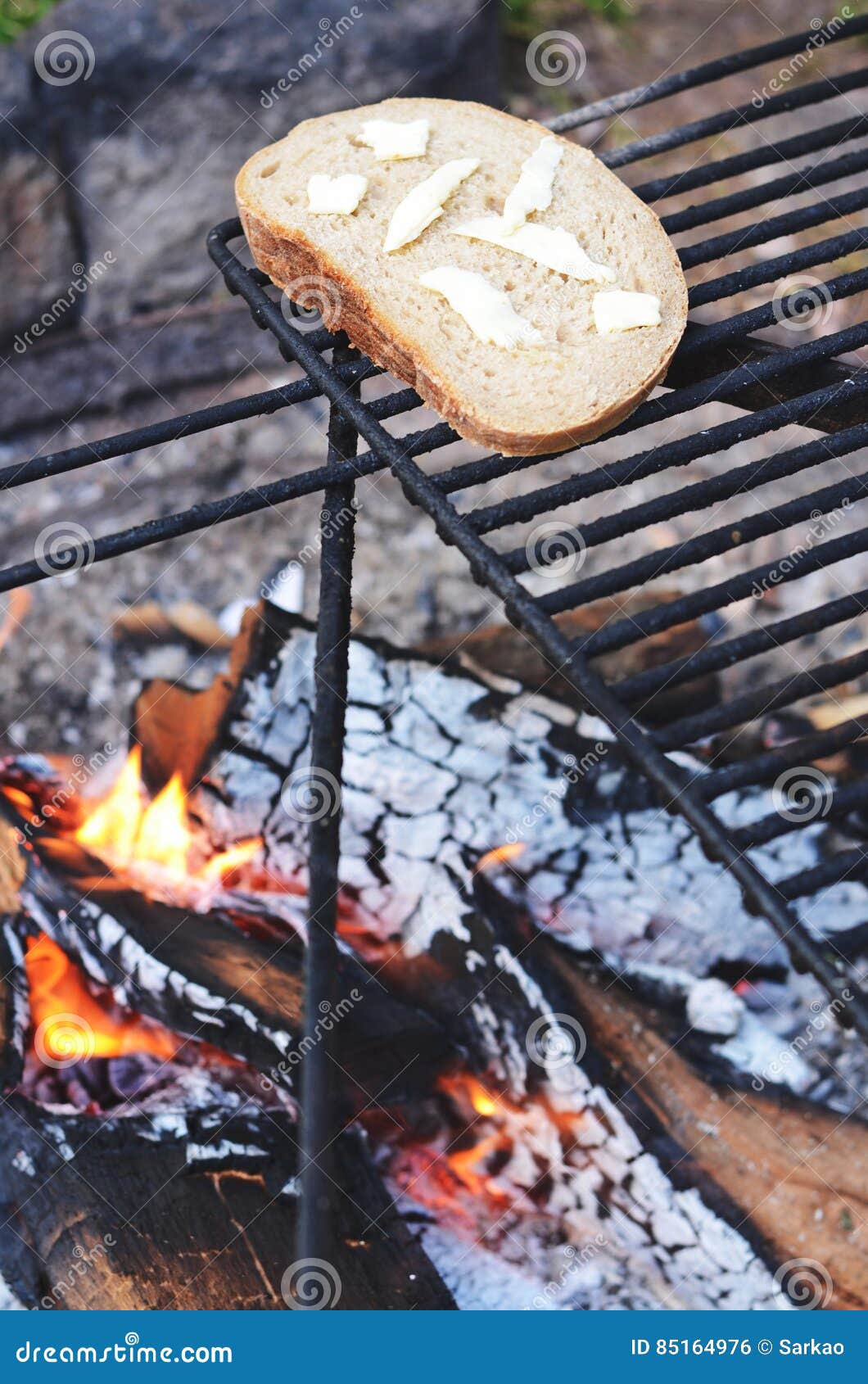 Bread on camping fire stock photo. Image of coal, outside - 85164976