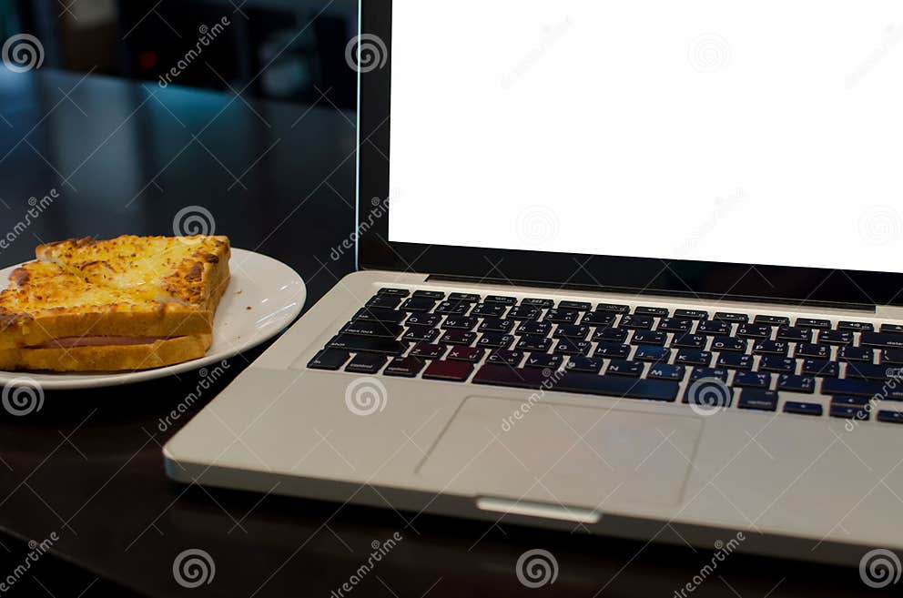 Bread and computer stock image. Image of office, table - 63632849