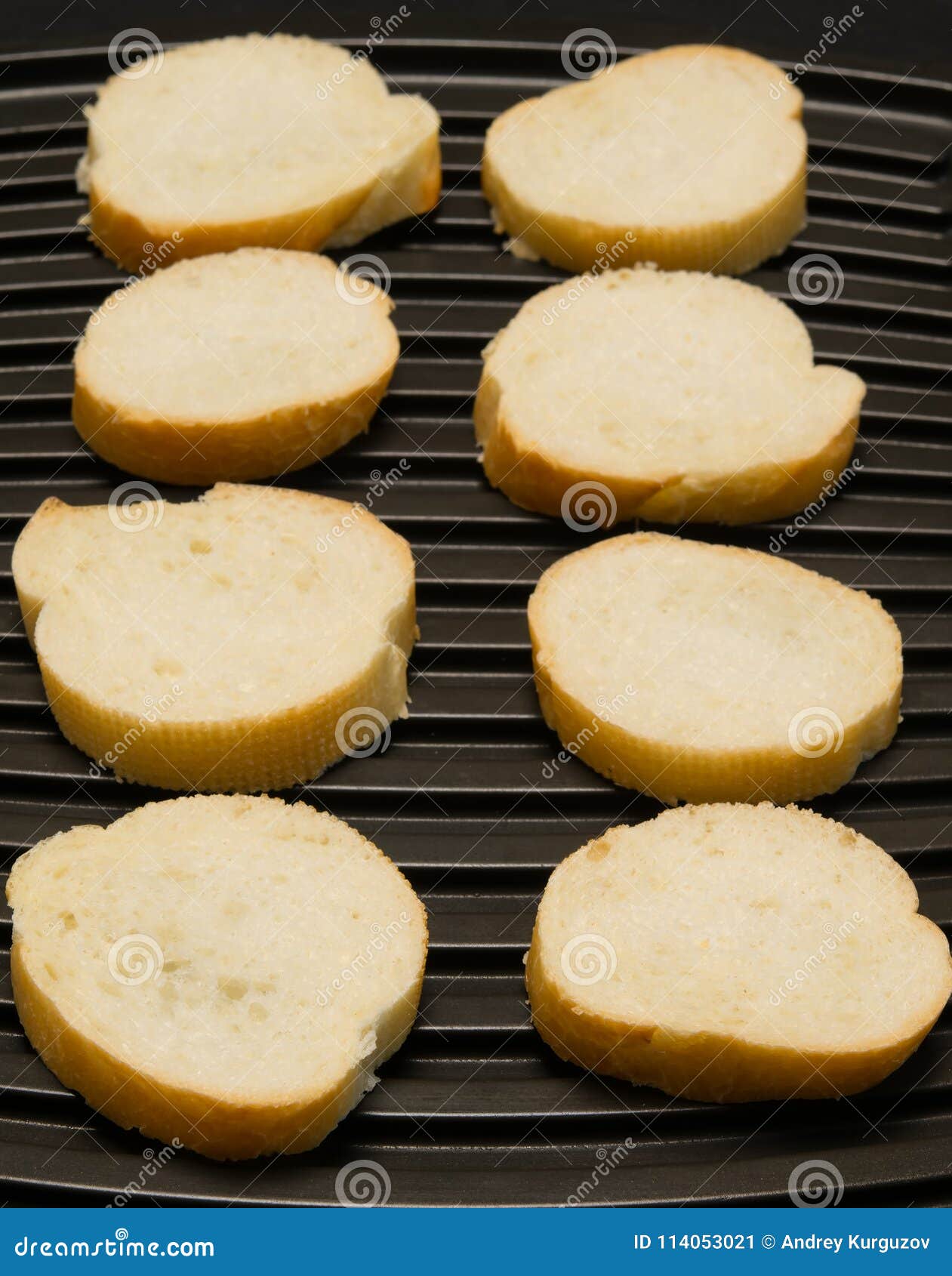 Bread is Cut into Eight Pieces and Decomposed on a Black Background ...