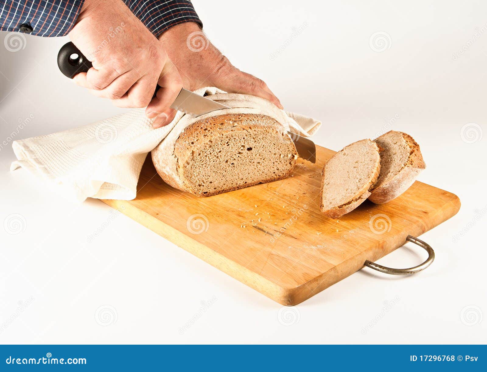 Bread cutting stock photo. Image of hand, food, homemade - 17296768