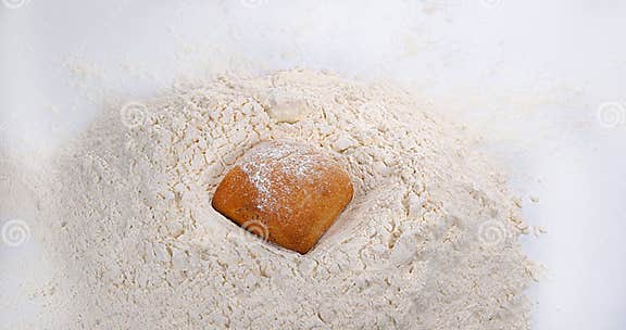 Bread Falling in Flour Against White Background Stock Photo - Image of ...