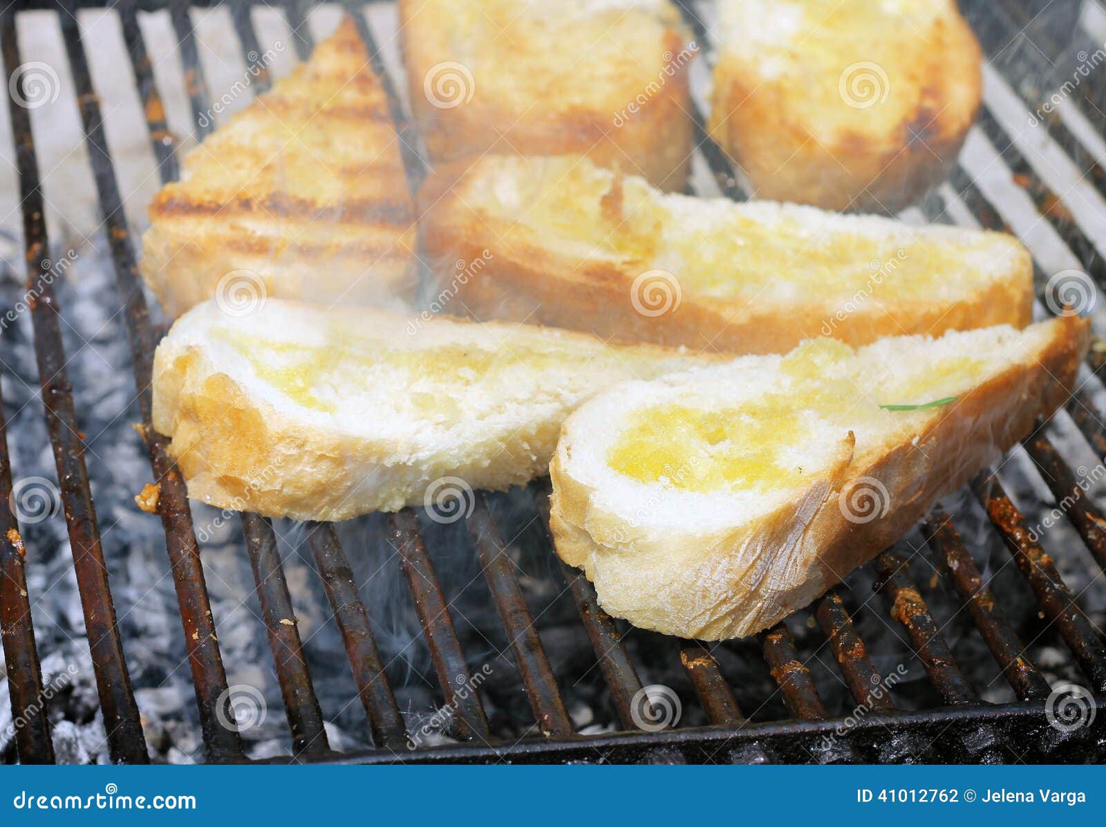 Bread on the grill stock photo. Image of hunger, sprinkled - 41012762