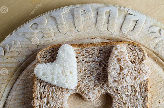 Bread Hearts on Vintage Bread Board Stock Photo - Image of tarnished ...