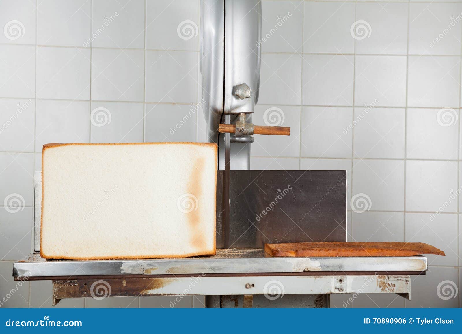 Bread Loaf on Cutting Machine in Bakery Stock Photo - Image of machine ...
