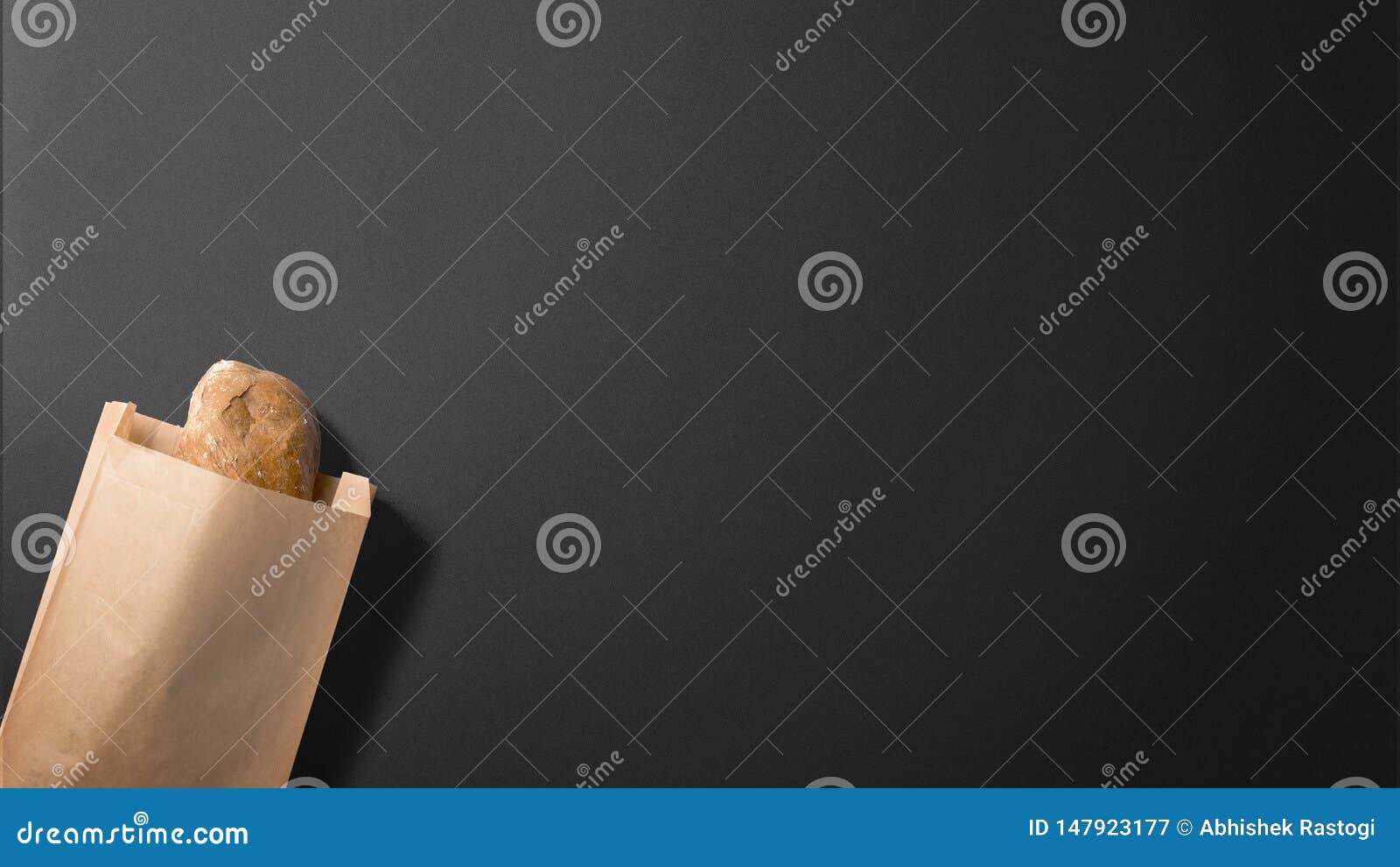 Bread Loaf in Envelope on Black Background Stock Image - Image of ...