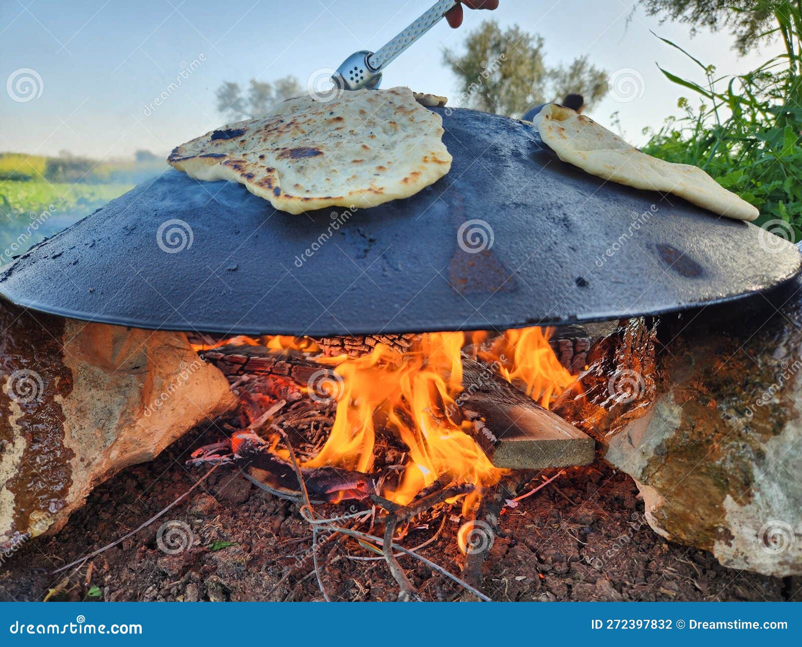 Bread made on the fire stock photo. Image of soil, bread - 272397832