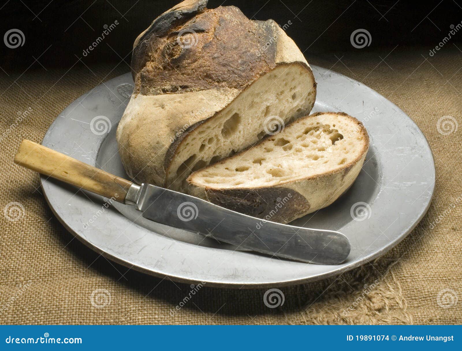 Bread on metal plate stock photo. Image of food, organic - 19891074