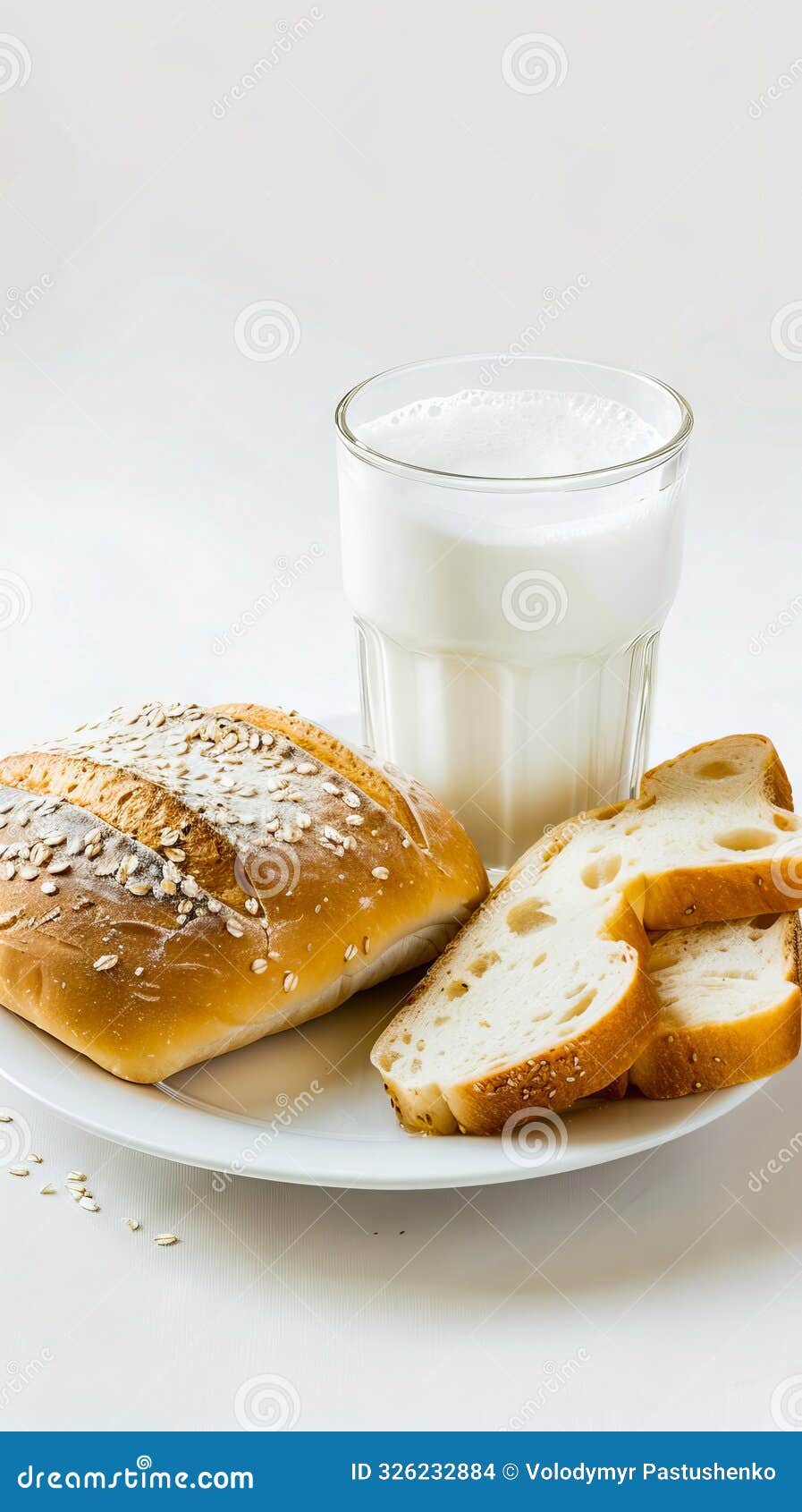Bread and milk on a plate stock photo. Image of dairy - 326232884