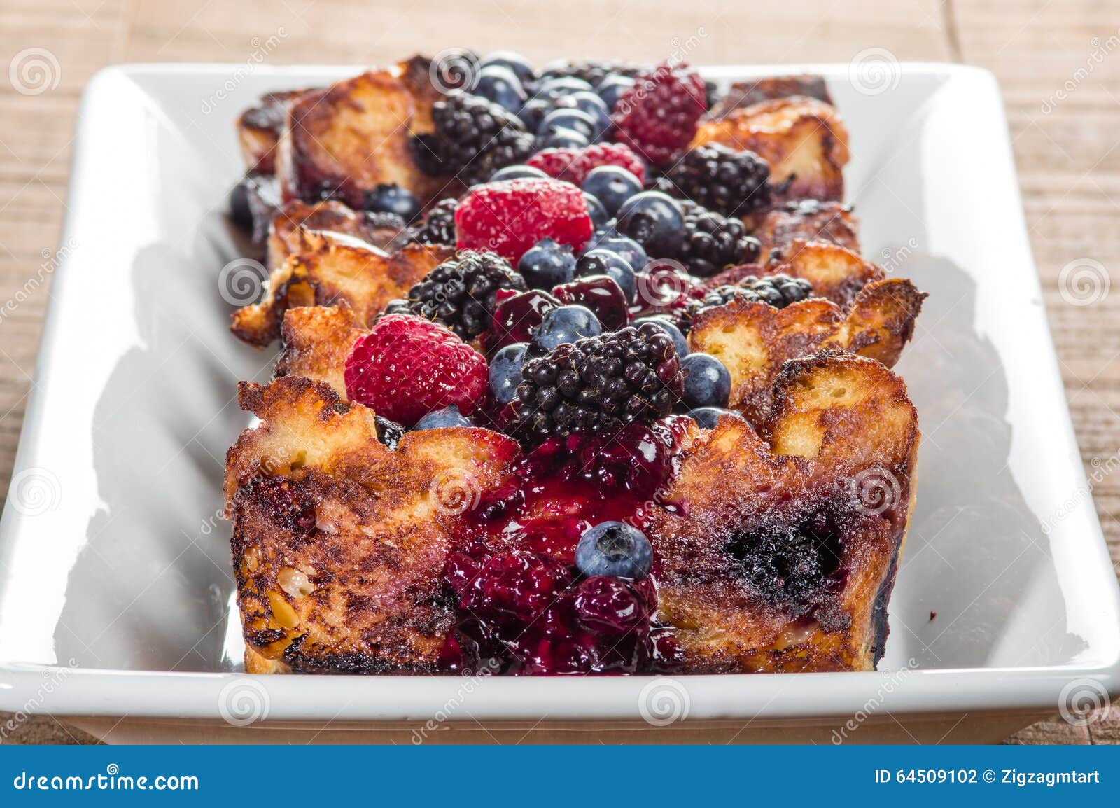 Bread Pudding with Berry Topping Stock Photo - Image of baked ...