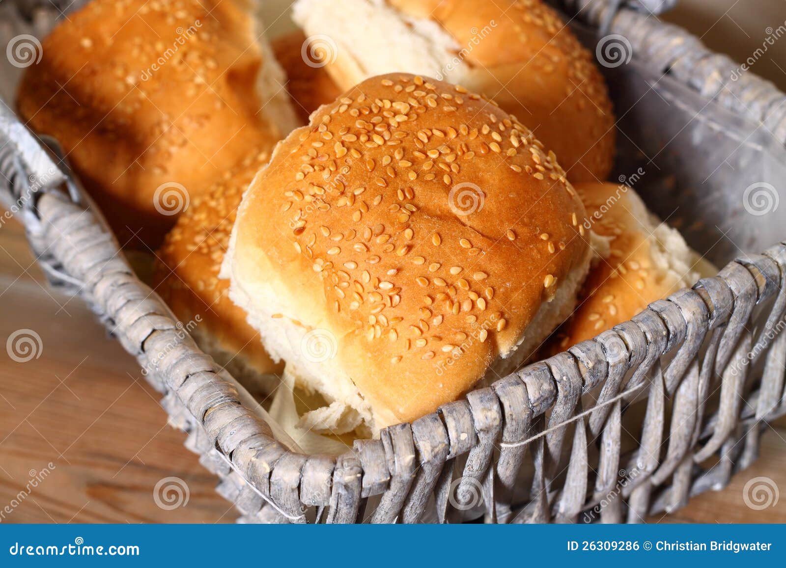 Bread rolls in basket a stock photo. Image of wood, wicker - 26309286