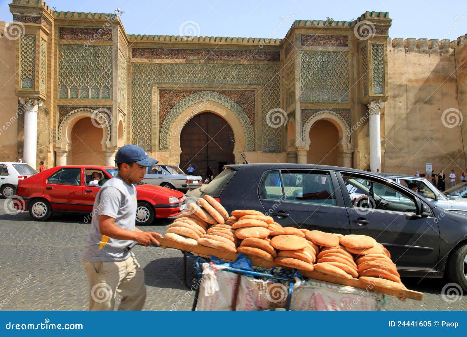 Bread Seller and Bab El-Mansour Gate Editorial Image - Image of cars ...