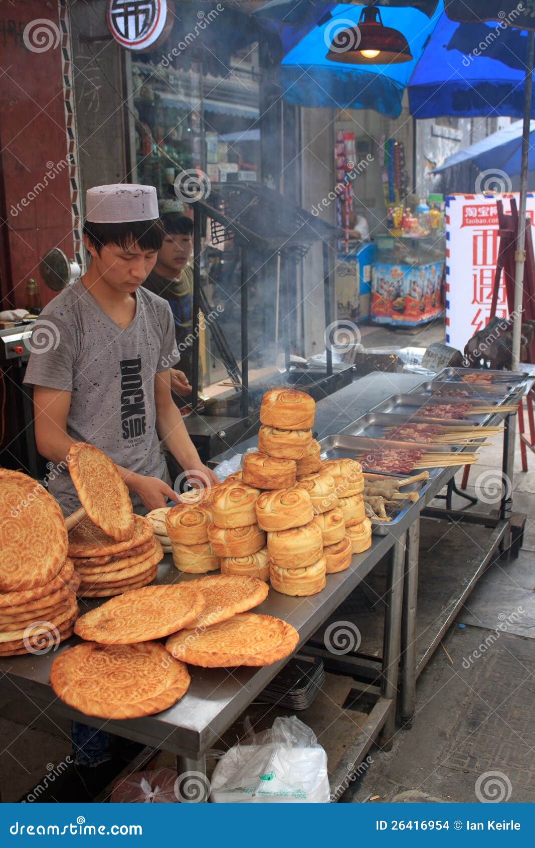 Bread seller in Xi an editorial stock image. Image of islam - 26416954