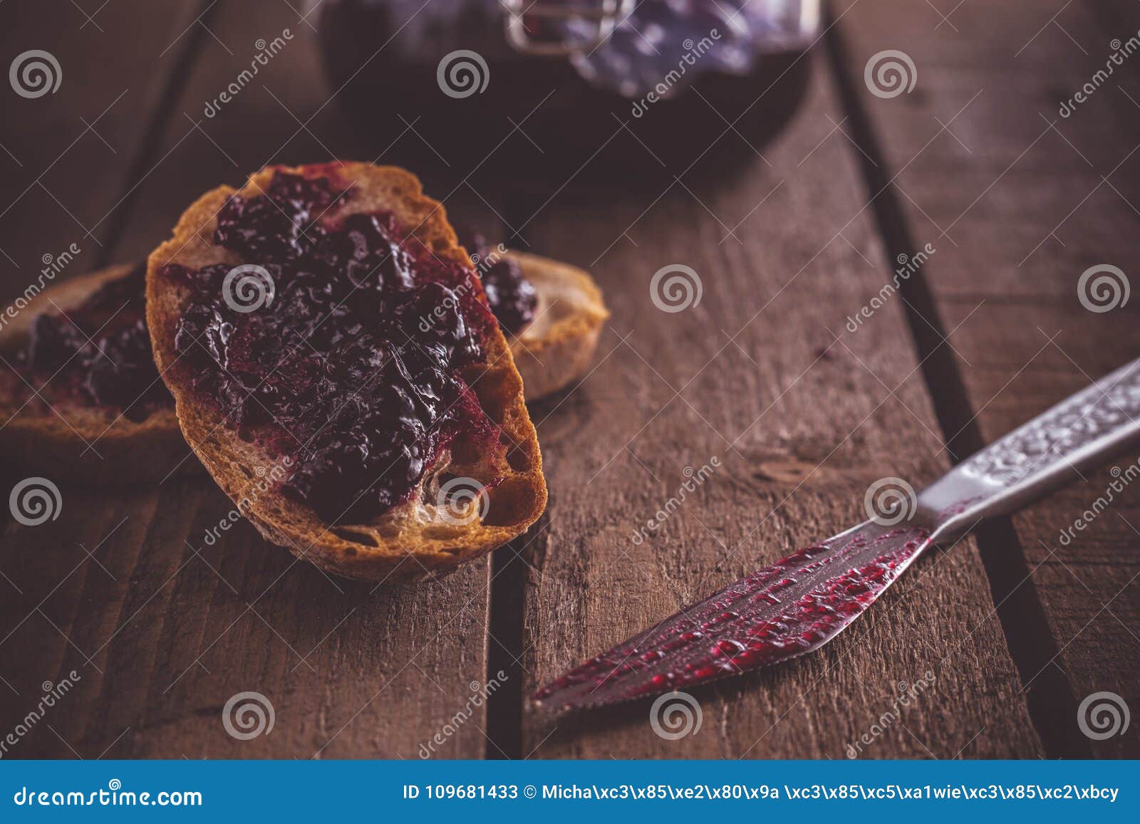 Bread slices with a jam. stock image. Image of eating - 109681433