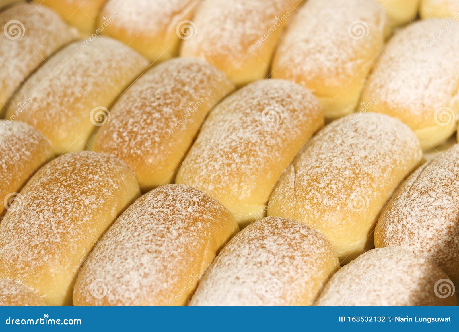 Bread Sprinkled with Icing Sugar, Arranged on Top of the Container ...