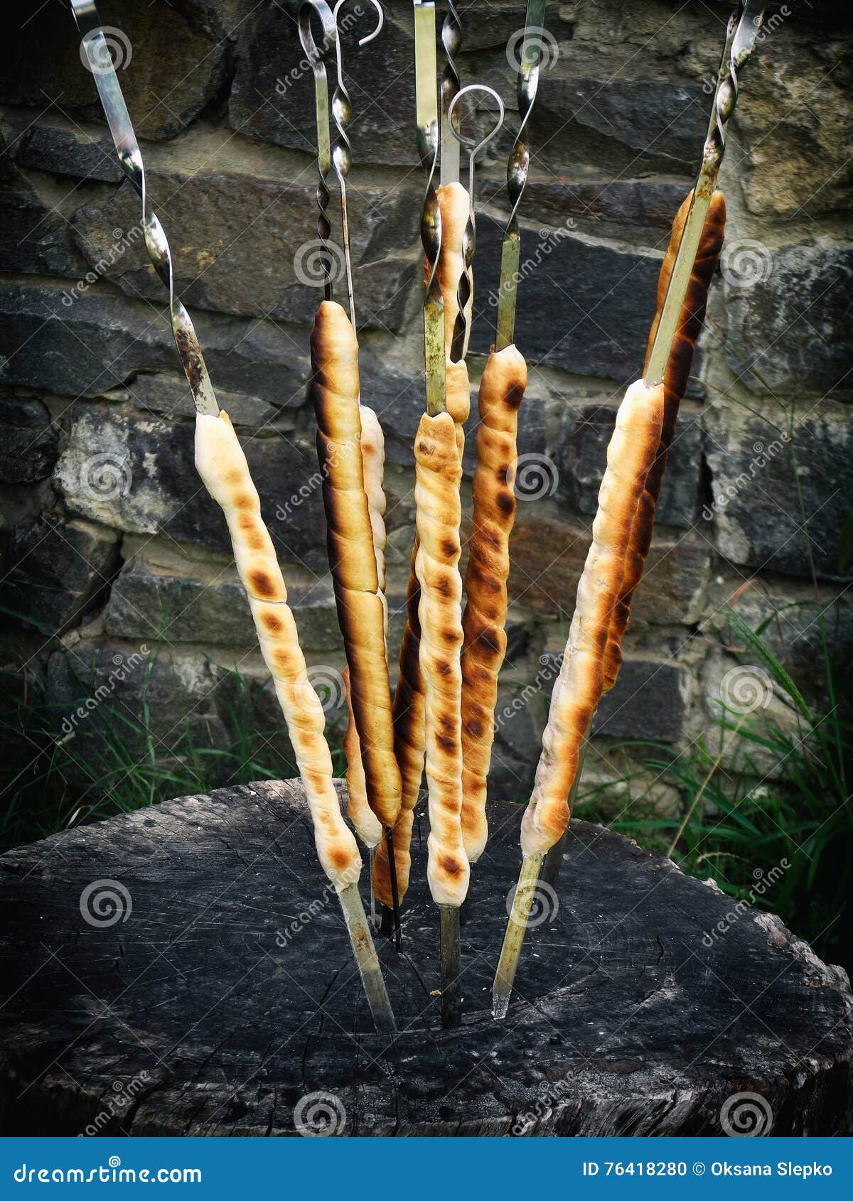 Bread Sticks of Dough Cooked on a Fire Stock Photo - Image of grilled ...