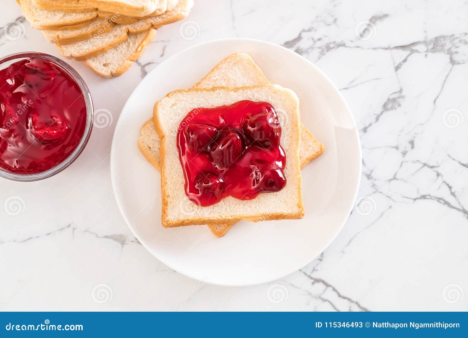 Bread with strawberry jam stock image. Image of dessert - 115346493
