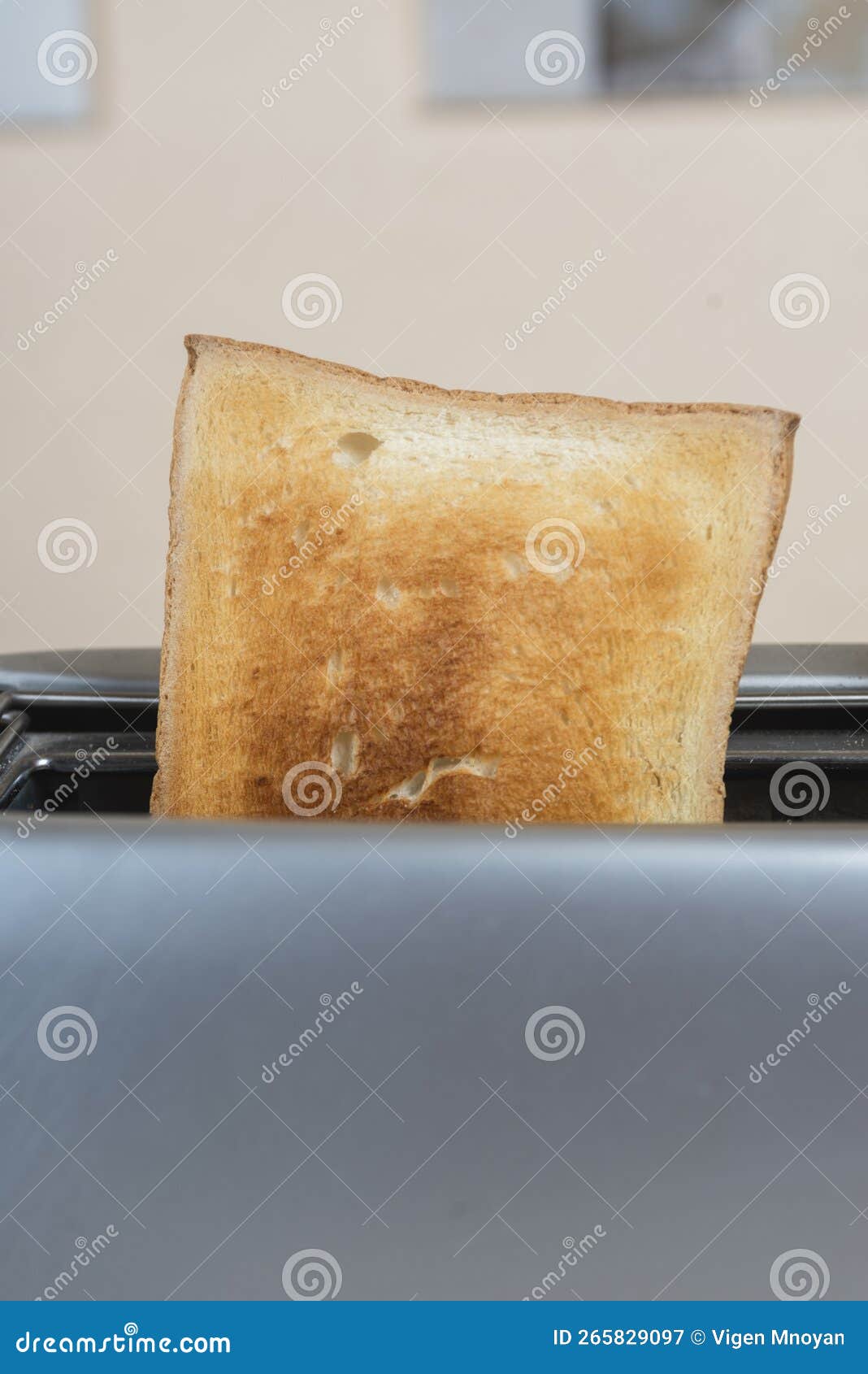 Bread in the Toaster on Wooden Desk. Kitchenware Stock Image - Image of ...