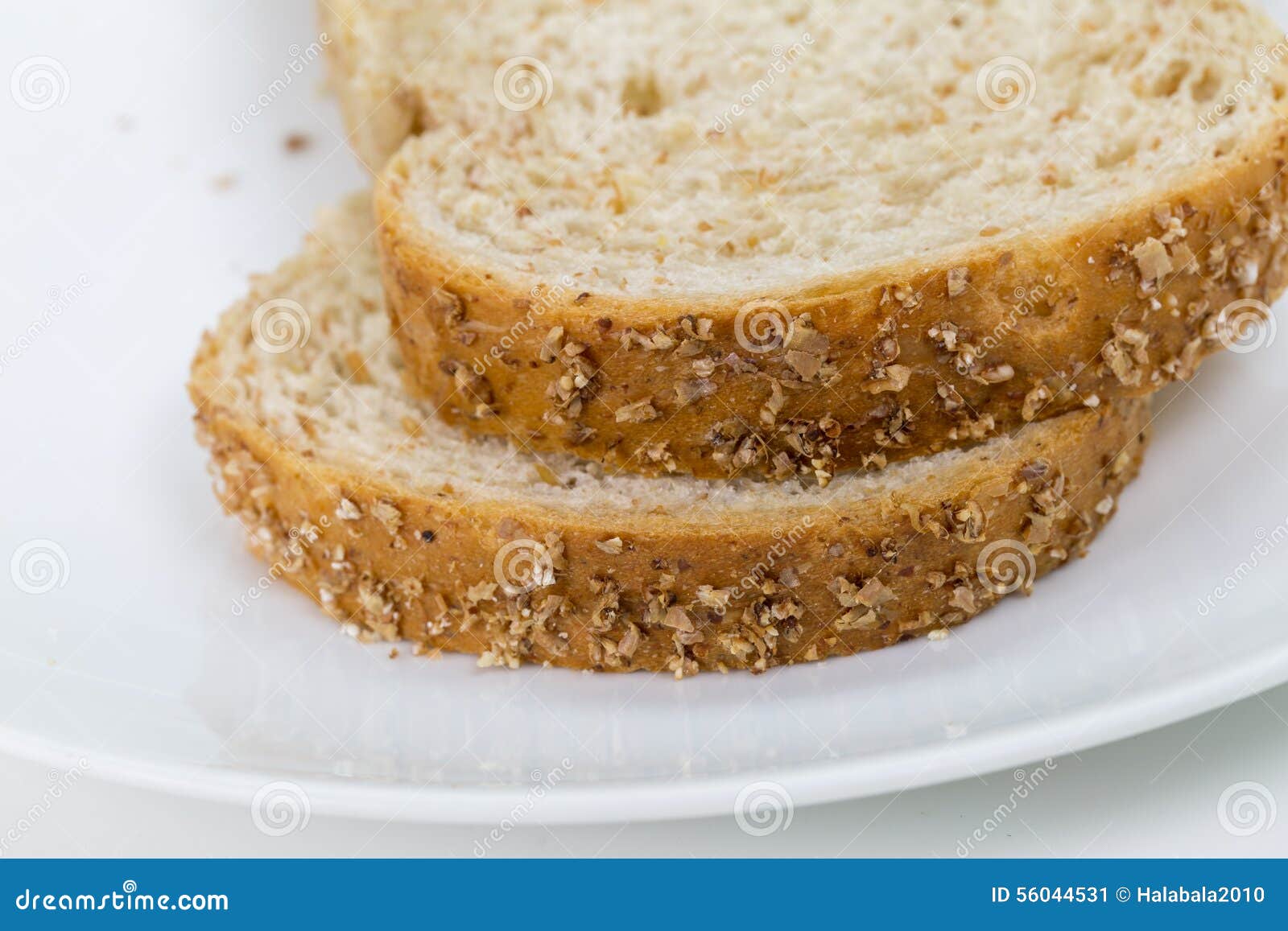 Bread on white plate stock image. Image of pastry, organic - 56044531
