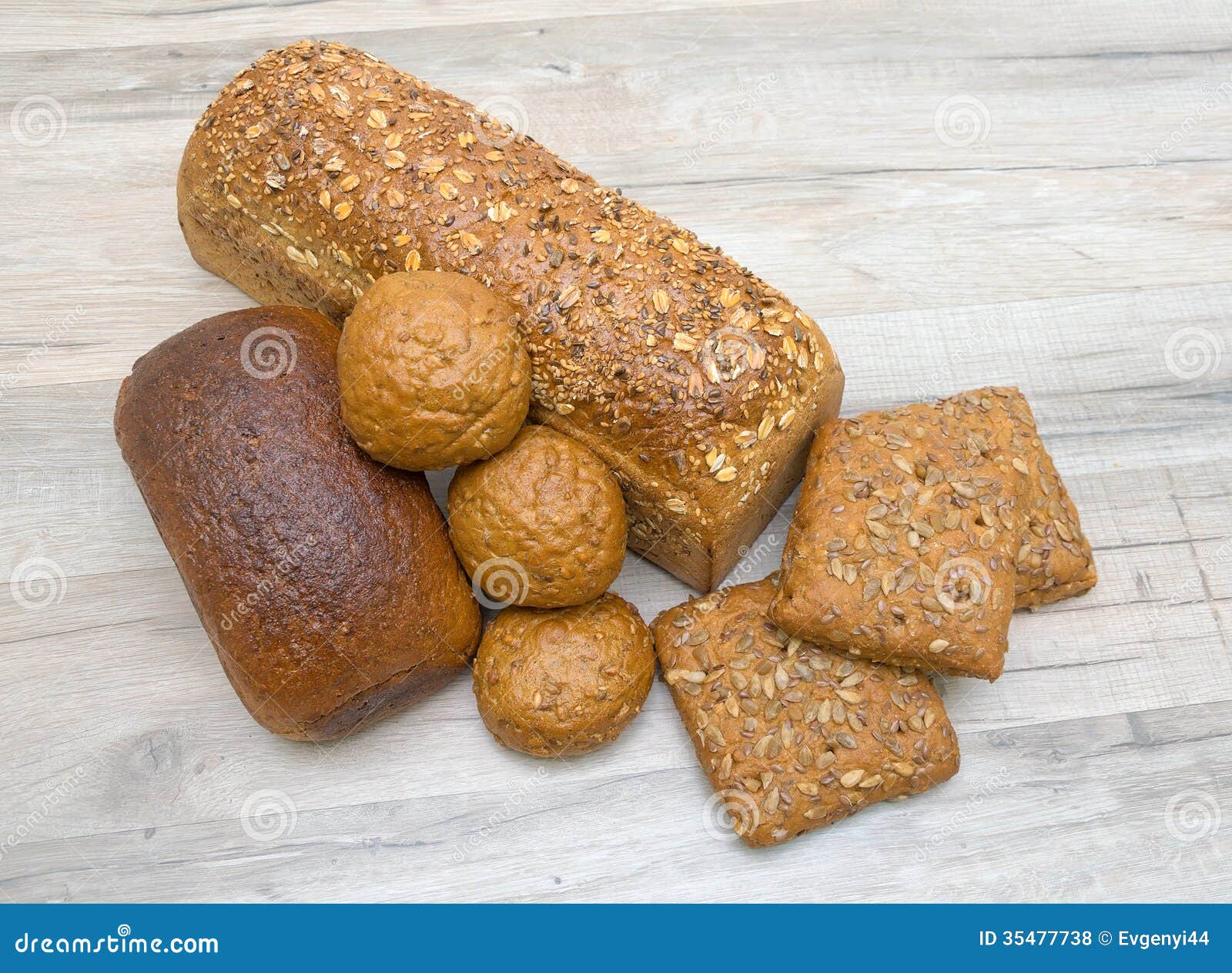 Bread on the Wooden Table Closeup Stock Photo - Image of group, rural ...