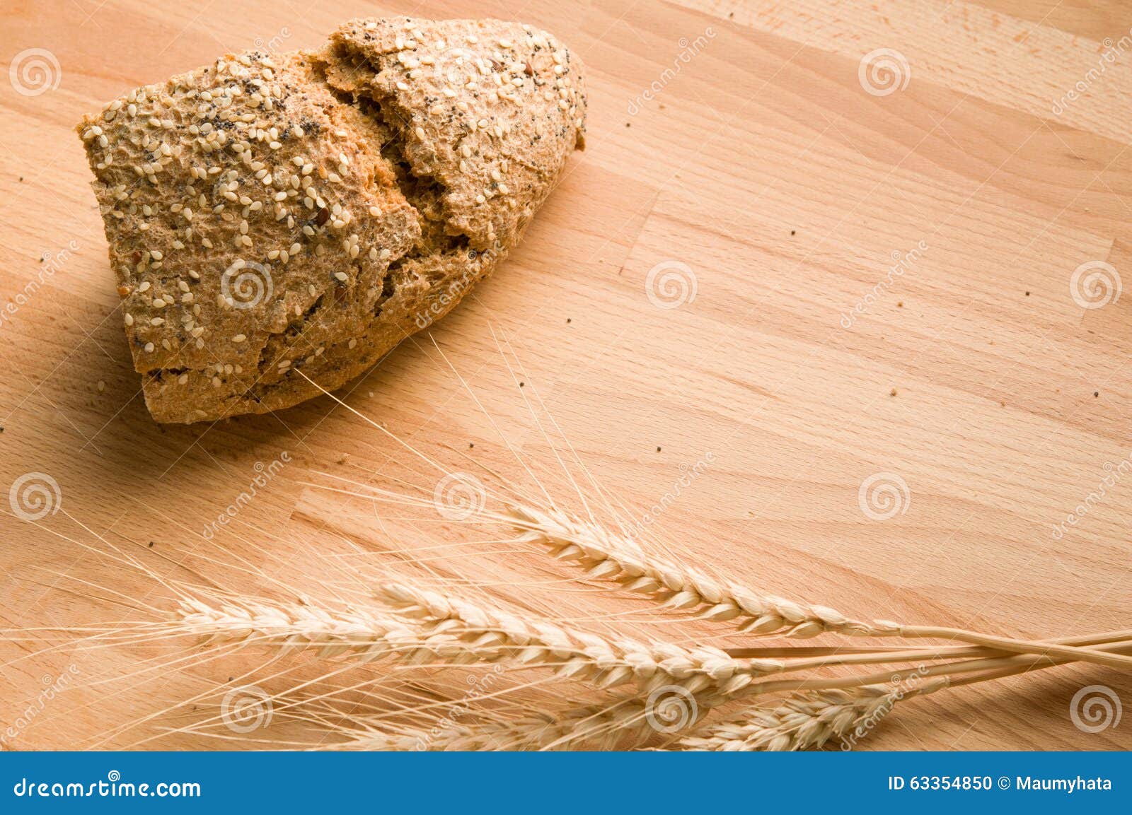 Bread on wooden table stock photo. Image of fresh, dark - 63354850