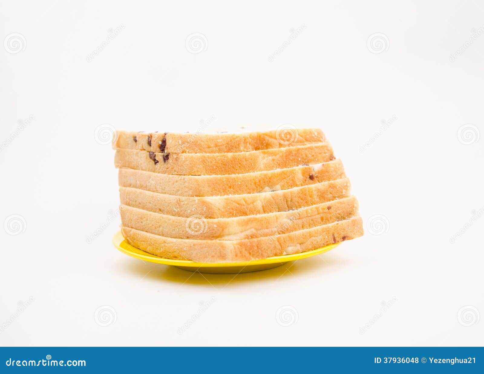 Bread on the Yellow Plate, in Front of the White Background Stock Photo ...