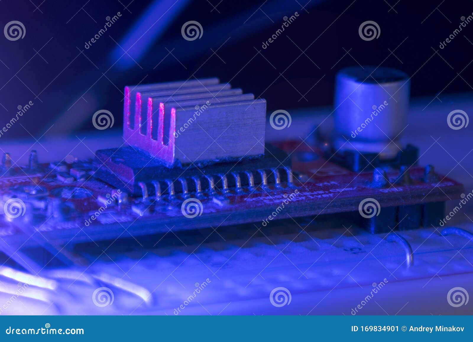 Breadboard And Microcontroller With Circuit And Light Sensor. ST Stock ...