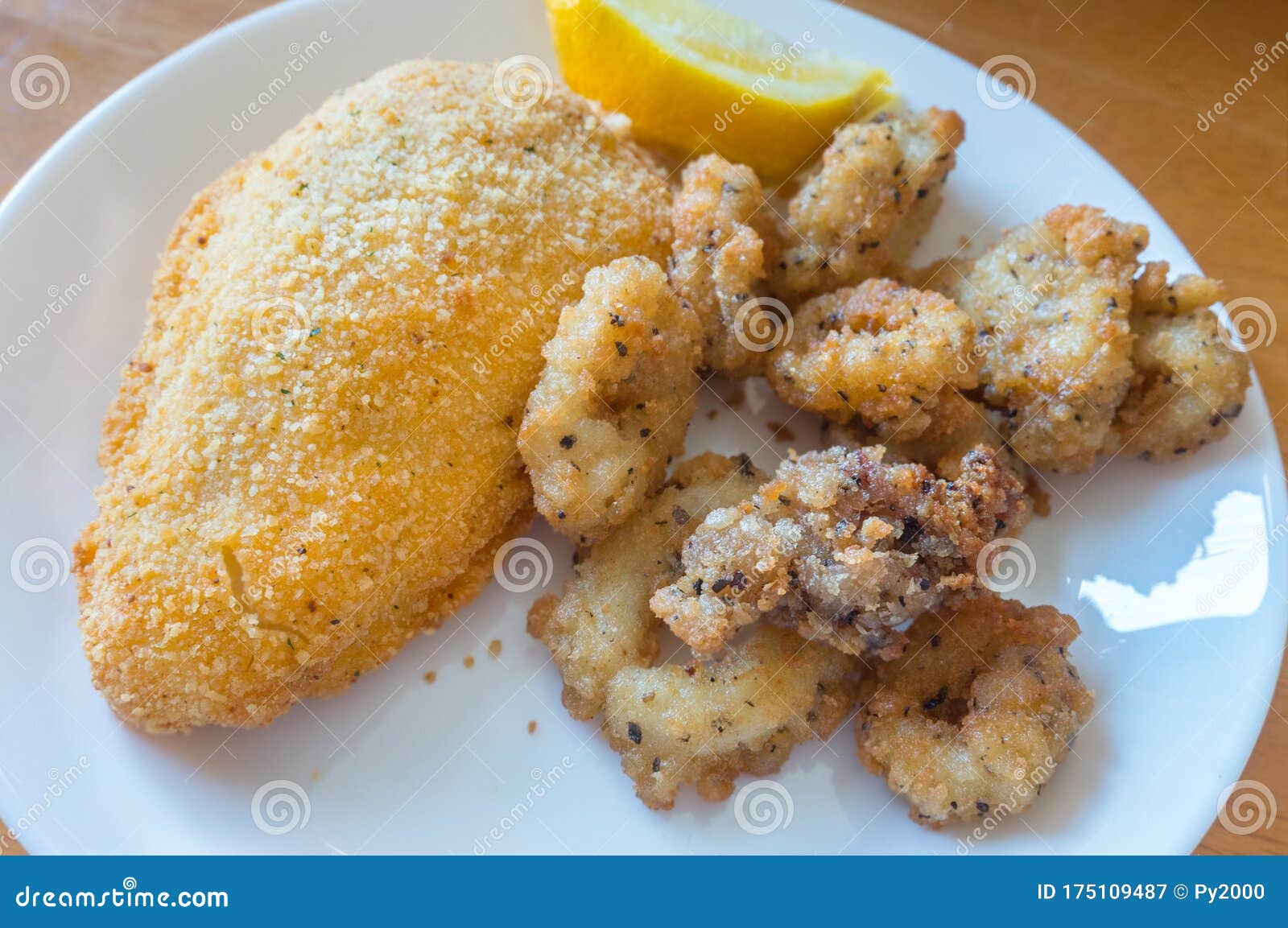 Breaded Chicken Breast and Calamari Stock Image - Image of plate, dish ...