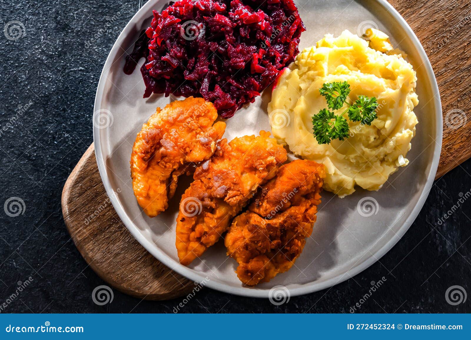 Breaded Chicken Cutlets Served with Potatoes and Beetroot Stock Photo ...