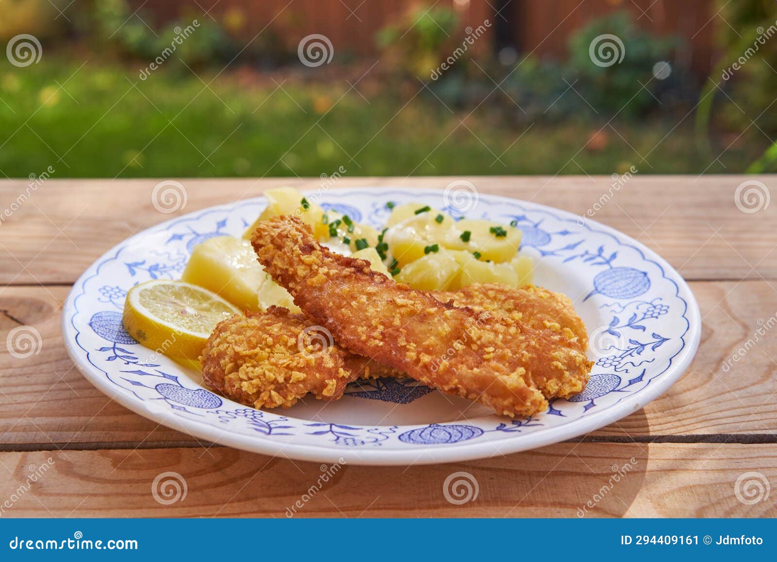 Breaded and Deep Fried Crispy Codfish with Boiled Potatoes. Stock Image ...