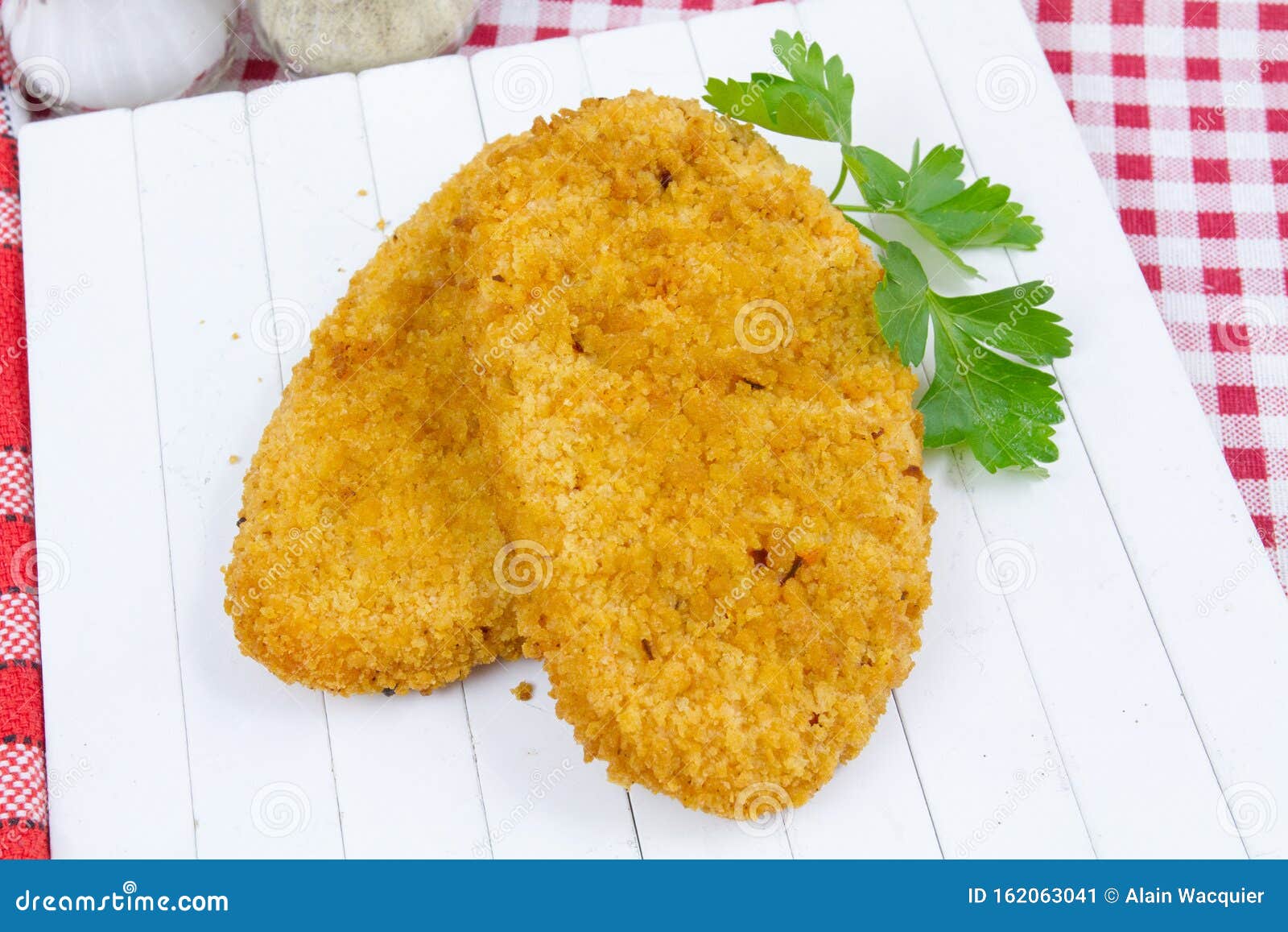 Breaded escalope stock image. Image of wooden, brown - 162063041
