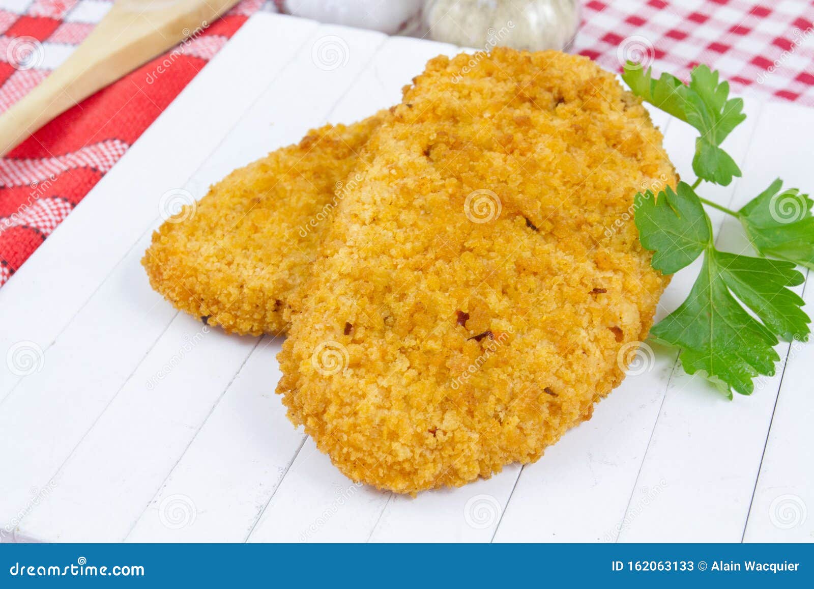 Breaded escalope stock image. Image of wooden, lunch - 162063133