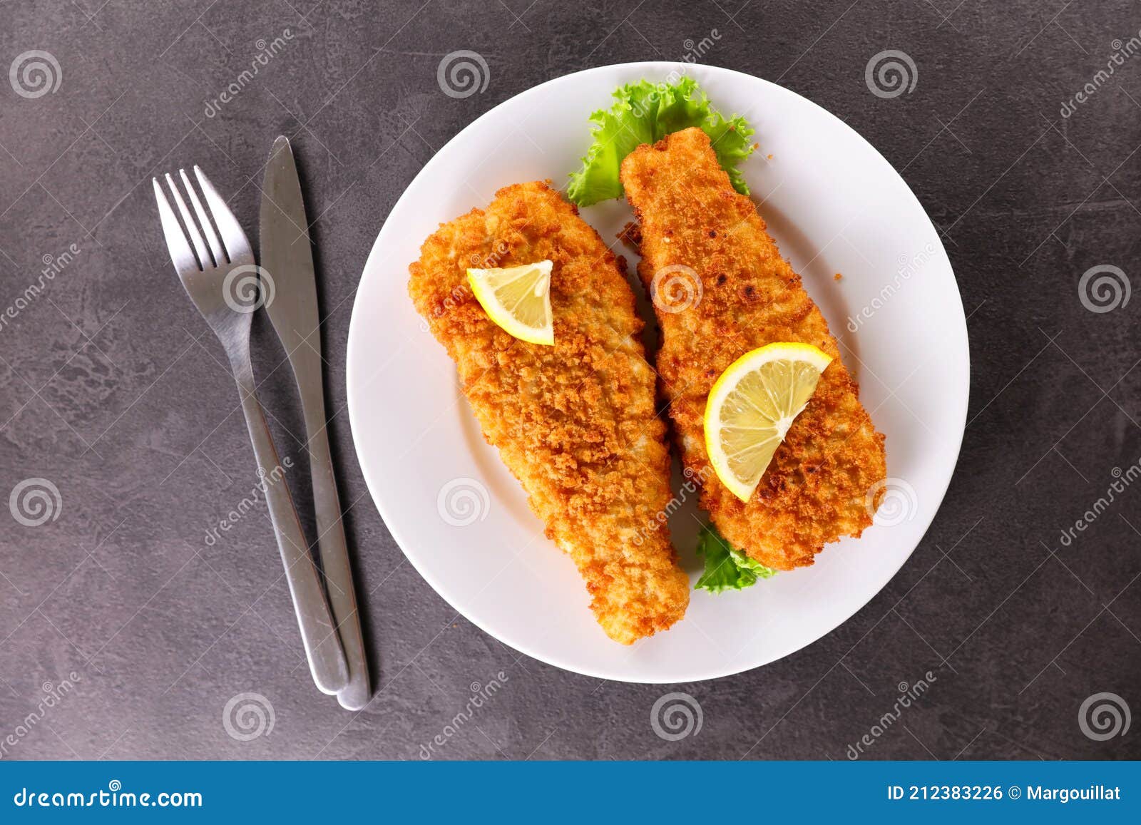 Breaded fish and lemon stock photo. Image of healthy - 212383226