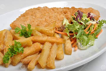 Breaded Fish Steak with Chips Stock Photo - Image of delicious, herbs ...