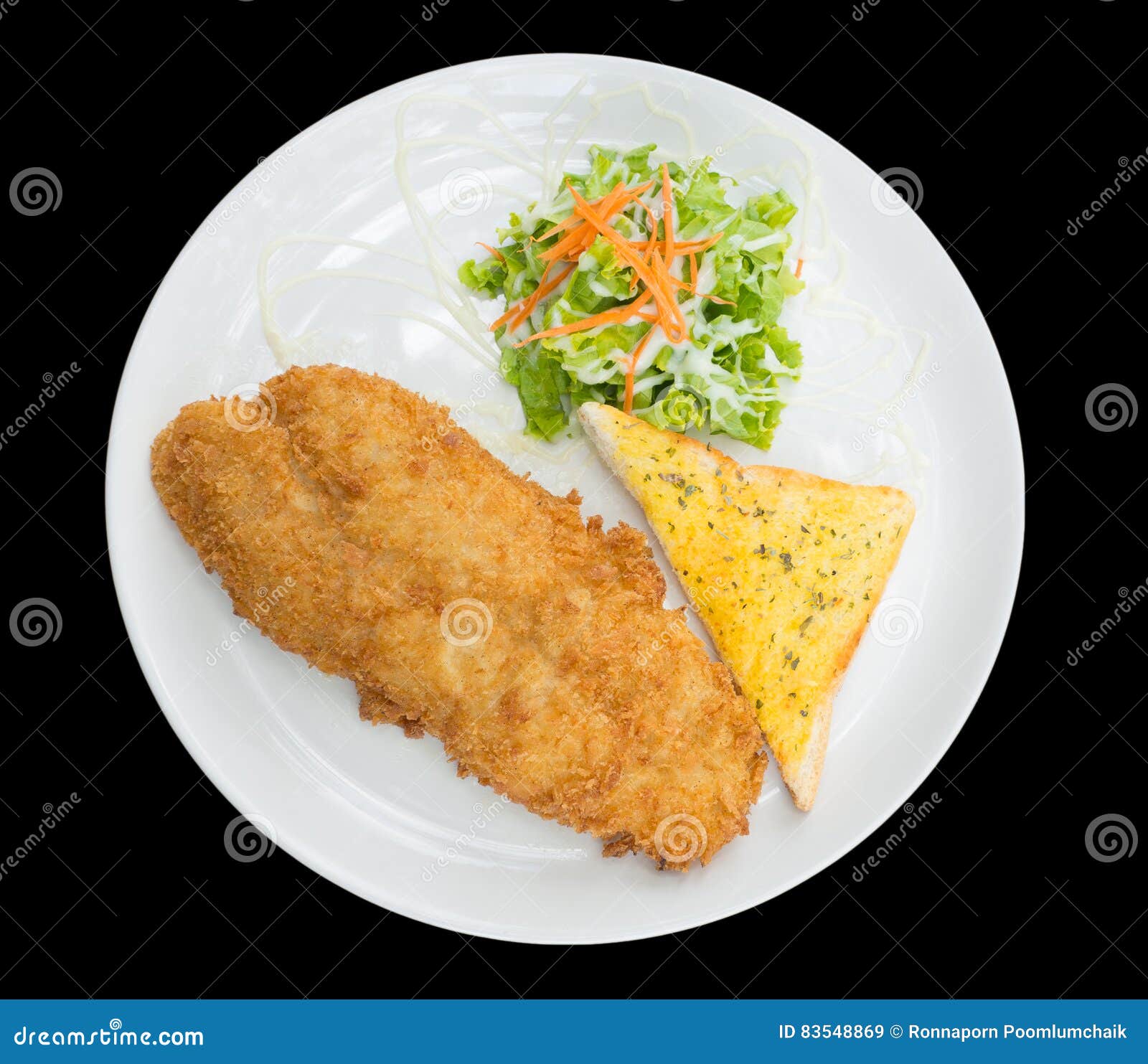 Breaded Fried Fish with Bread and Vegetable Isolated on the Black ...