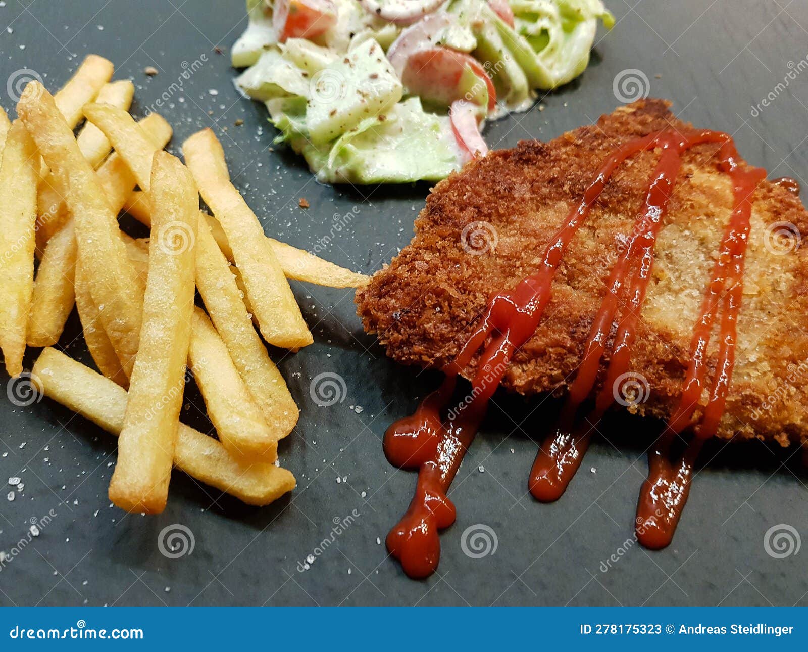 Breaded wiener schnitzel stock image. Image of meal - 278175323