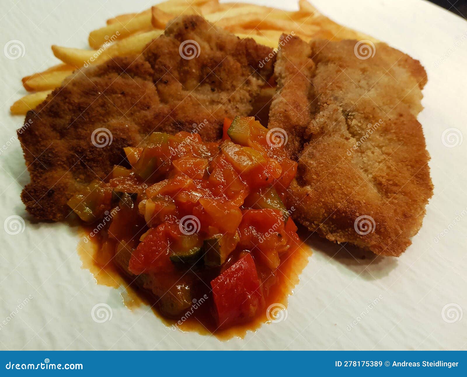 Breaded wiener schnitzel stock image. Image of dish - 278175389