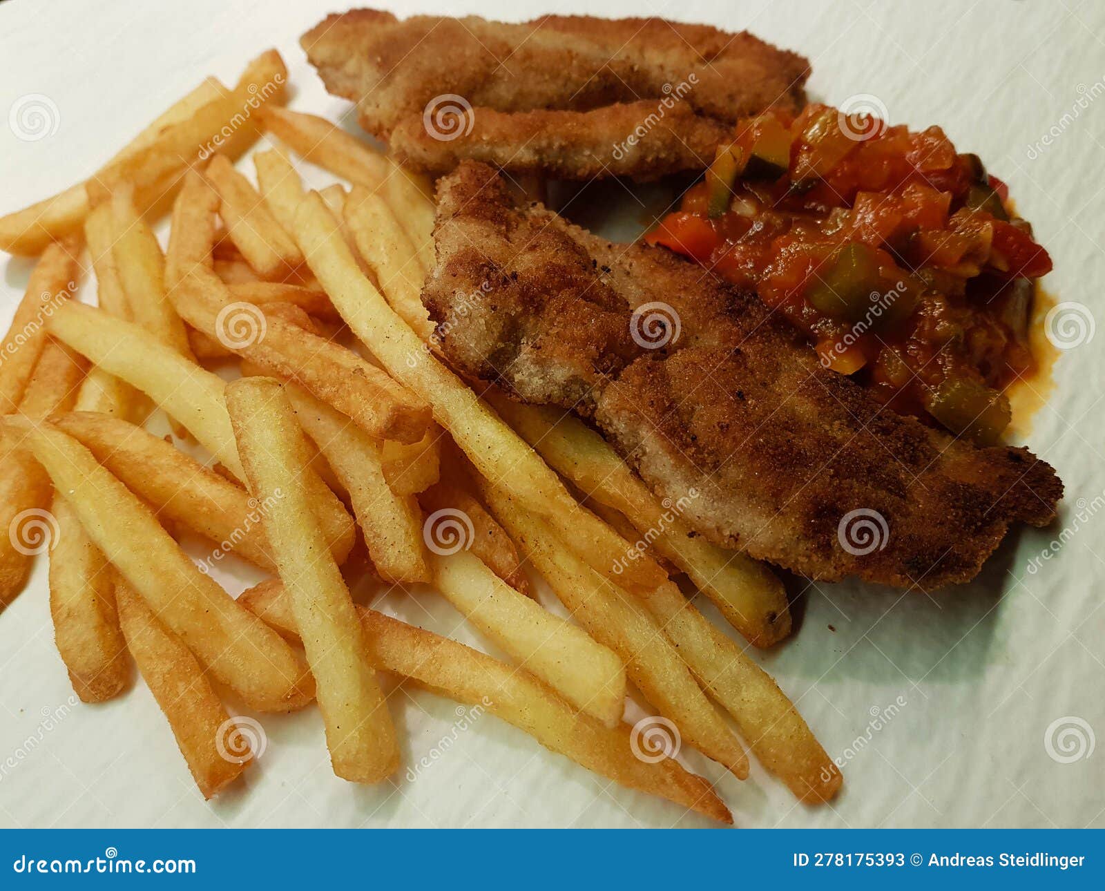 Breaded wiener schnitzel stock image. Image of meal - 278175393