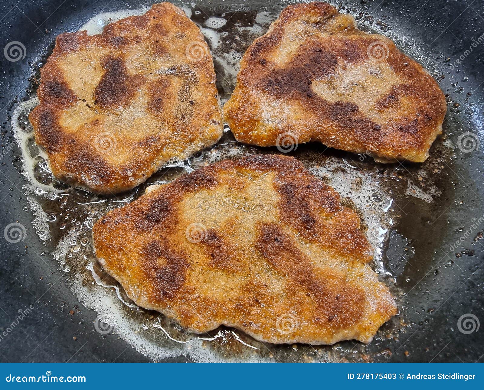 Breaded wiener schnitzel stock image. Image of bread - 278175403