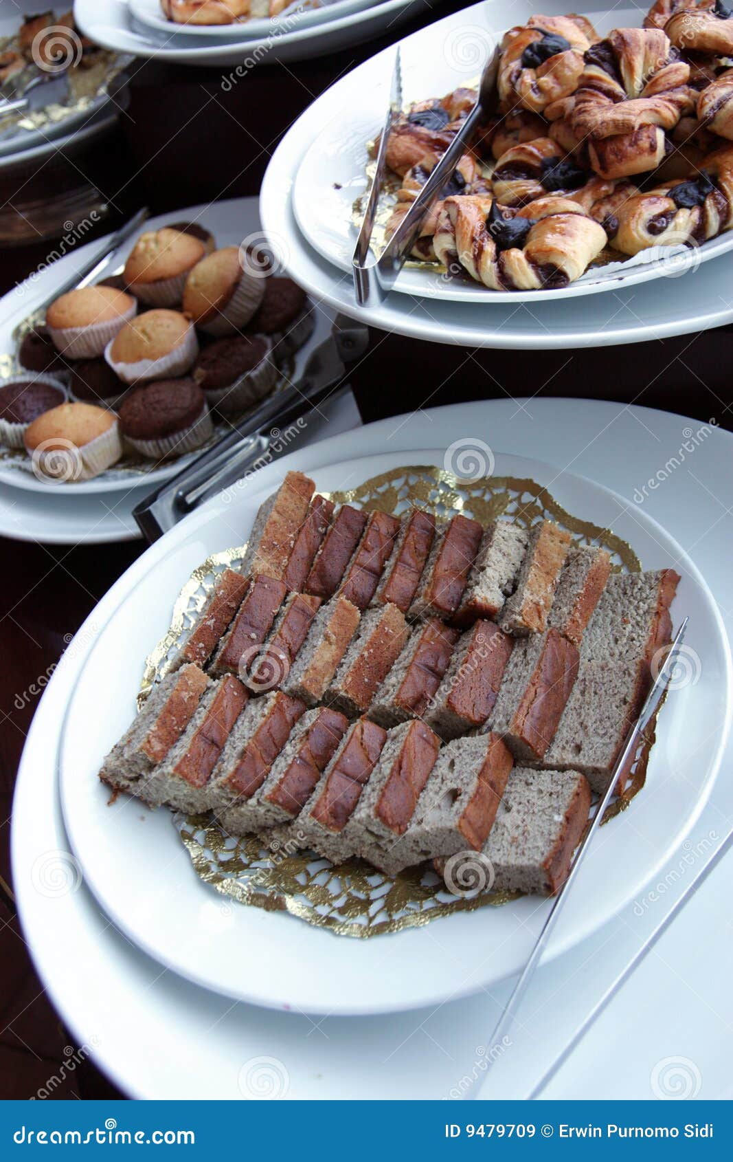 Breads at buffet breakfast stock image. Image of plates - 9479709