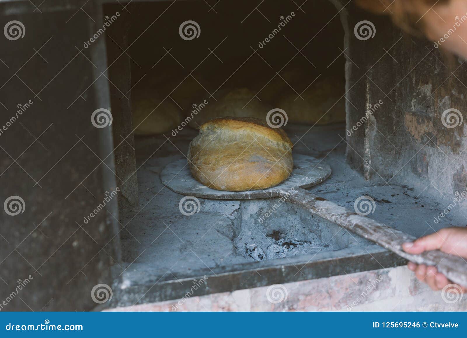 Breads in the furnace stock photo. Image of loaf, homemade - 125695246