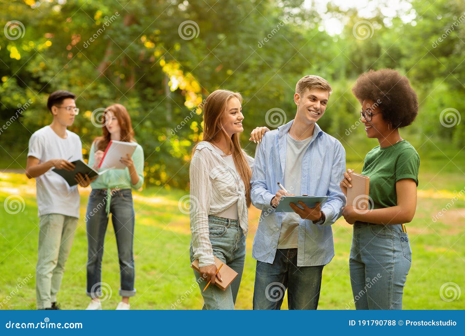 Break between Classes. Group of Multicultural College Students Resting ...