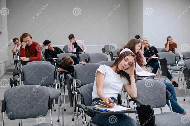 A Break between Classes in High School. Students Rest and Sleep in the ...