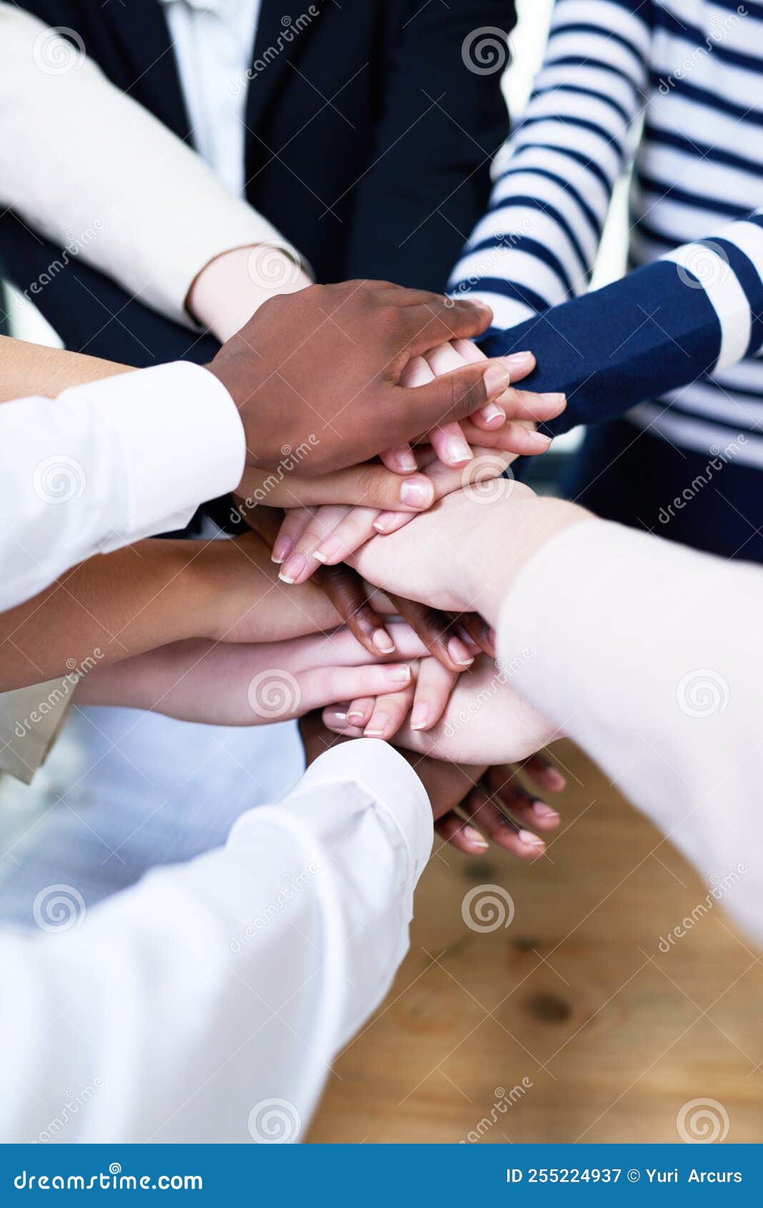 And...break. High Angle Shot of a Group of Colleagues Standing with ...