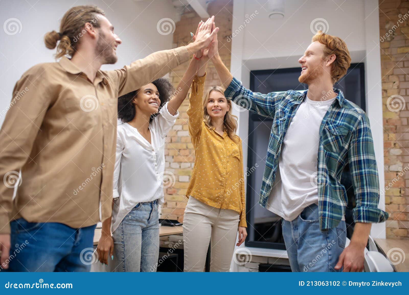 Team of Young People Working Together and Having a Break Stock Photo ...