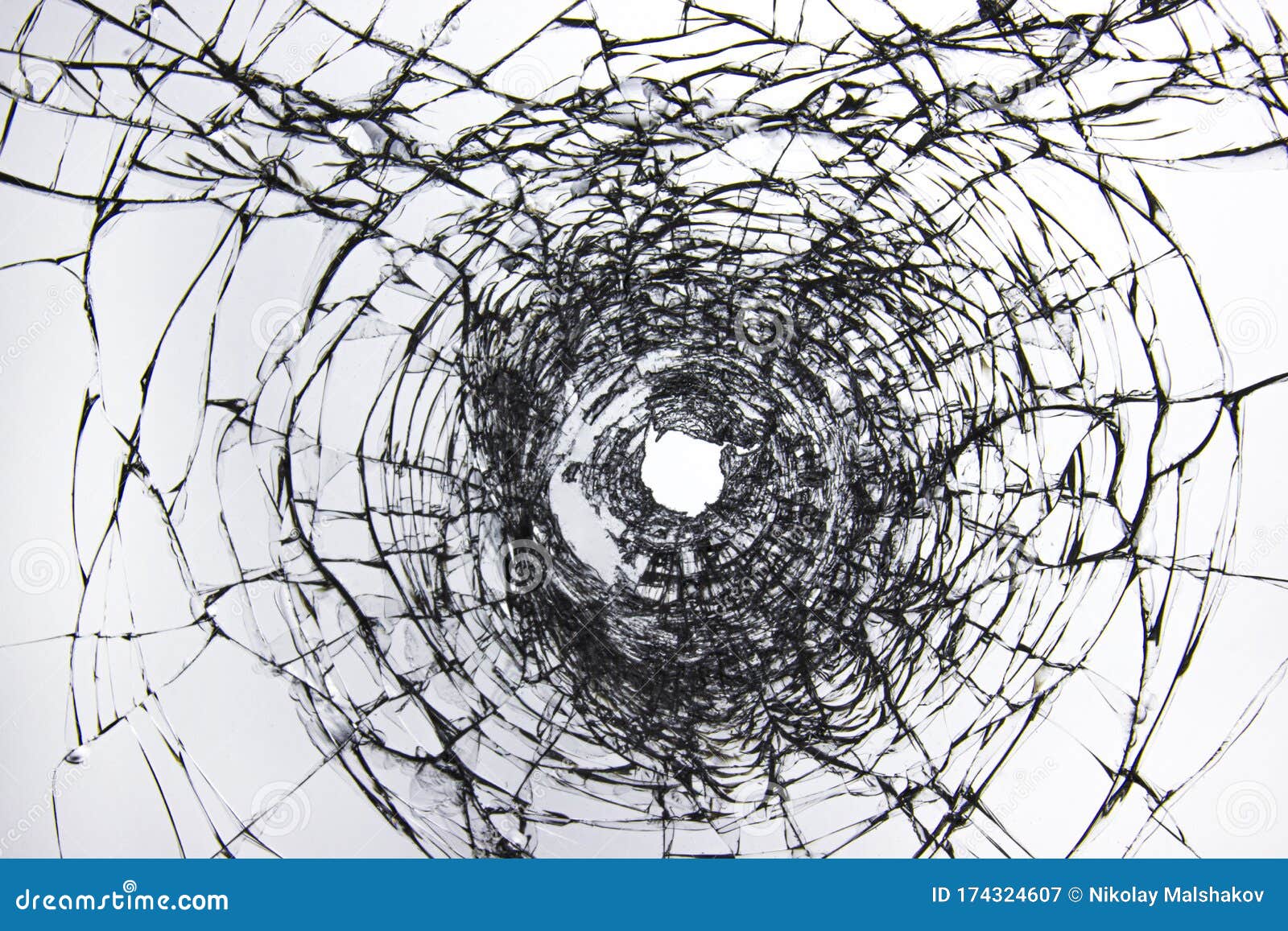 Break through the Windshield. Broken Glass with a Hole from a Firearm ...